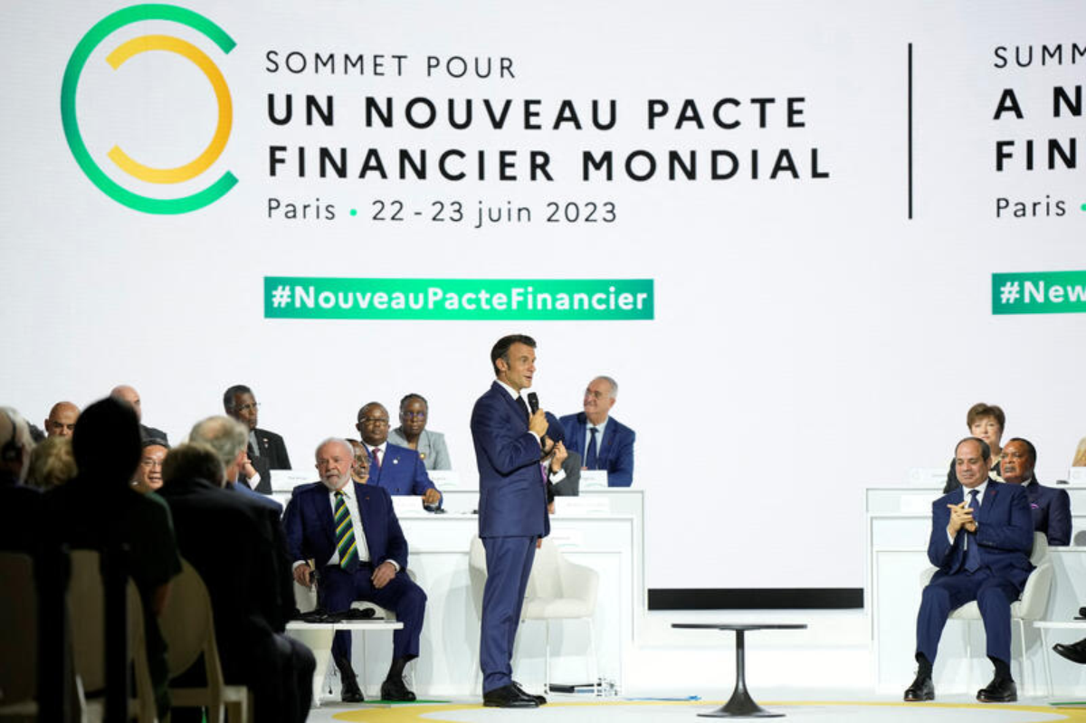 Paris finance summit breaks new ground in climate, poverty fight ...